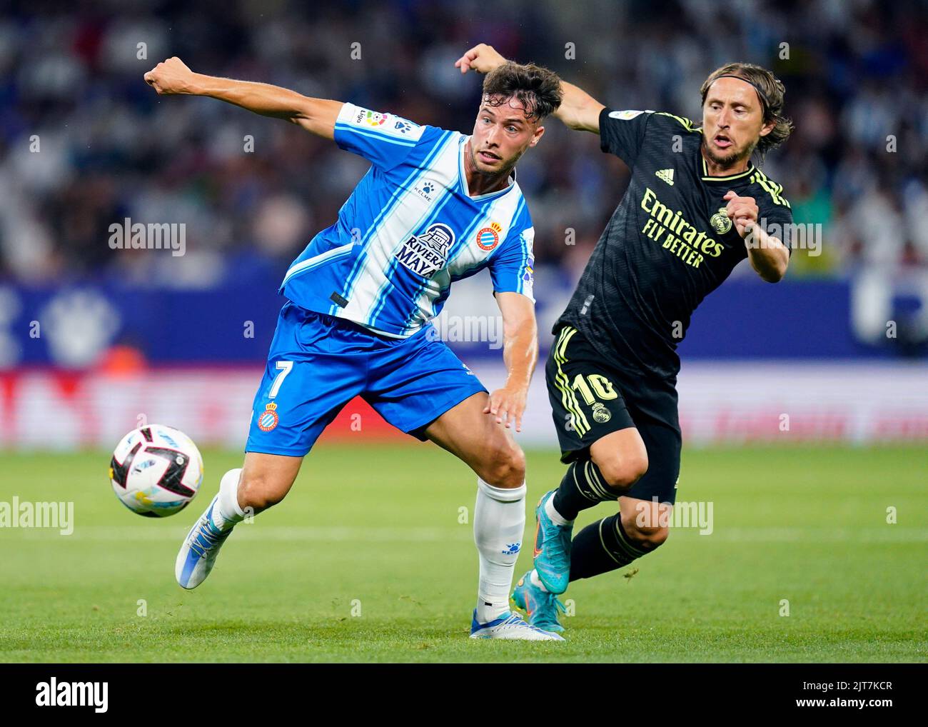 Javi Puado of RCD Espanyol and Luka Modric of Real Madrid during the La ...