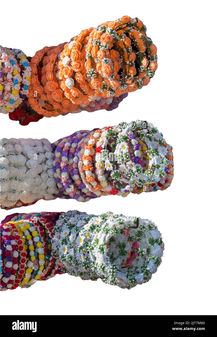 There are fake textile flowers on the crown. Colorful isolated crowns ...