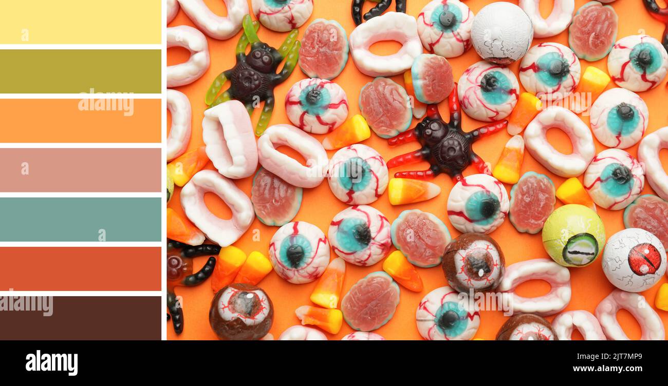 Many Halloween treats on orange background. Different color patterns ...