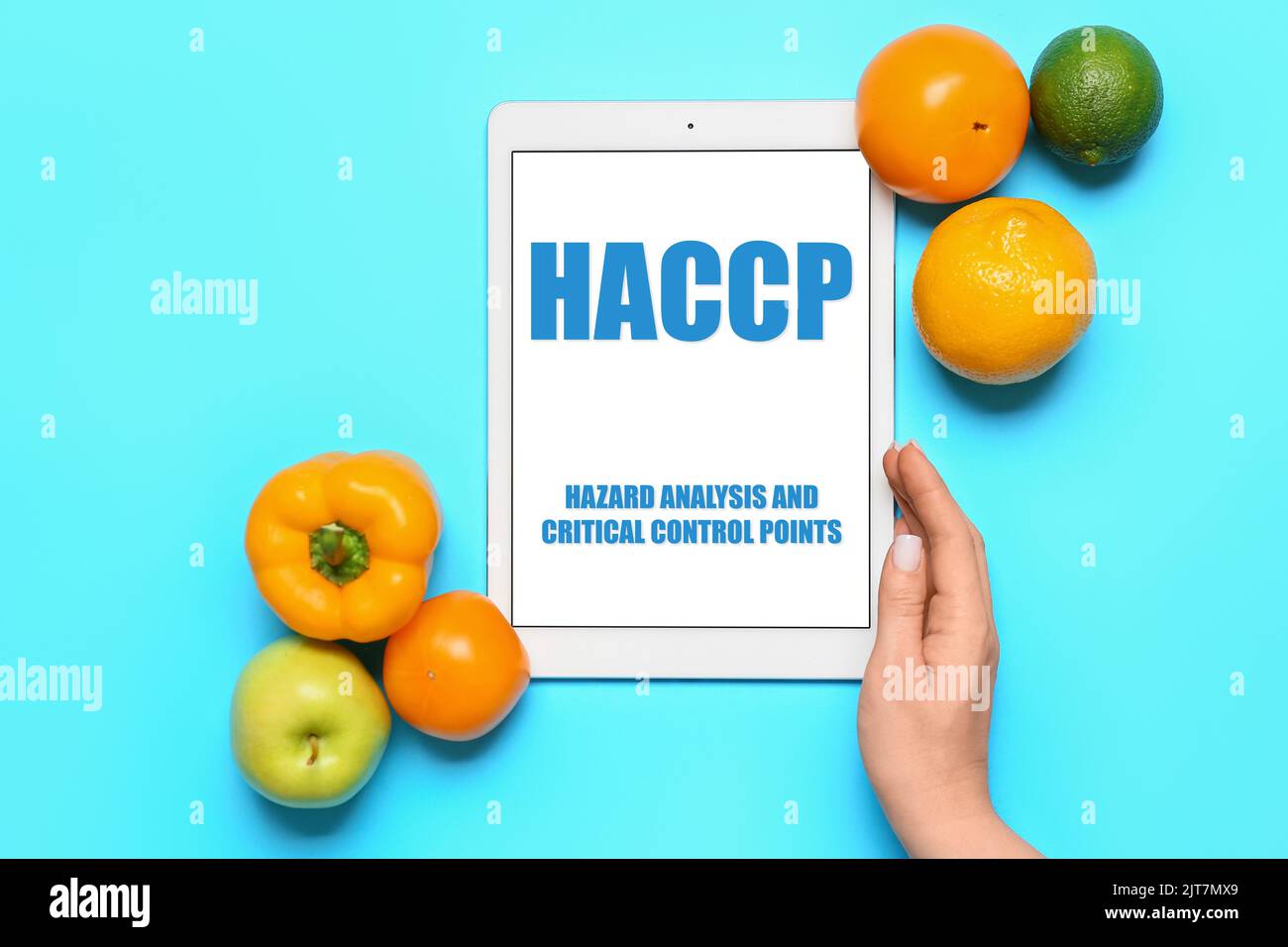 Tablet computer with text HAZARD ANALYSIS AND CRITICAL POINTS, female ...
