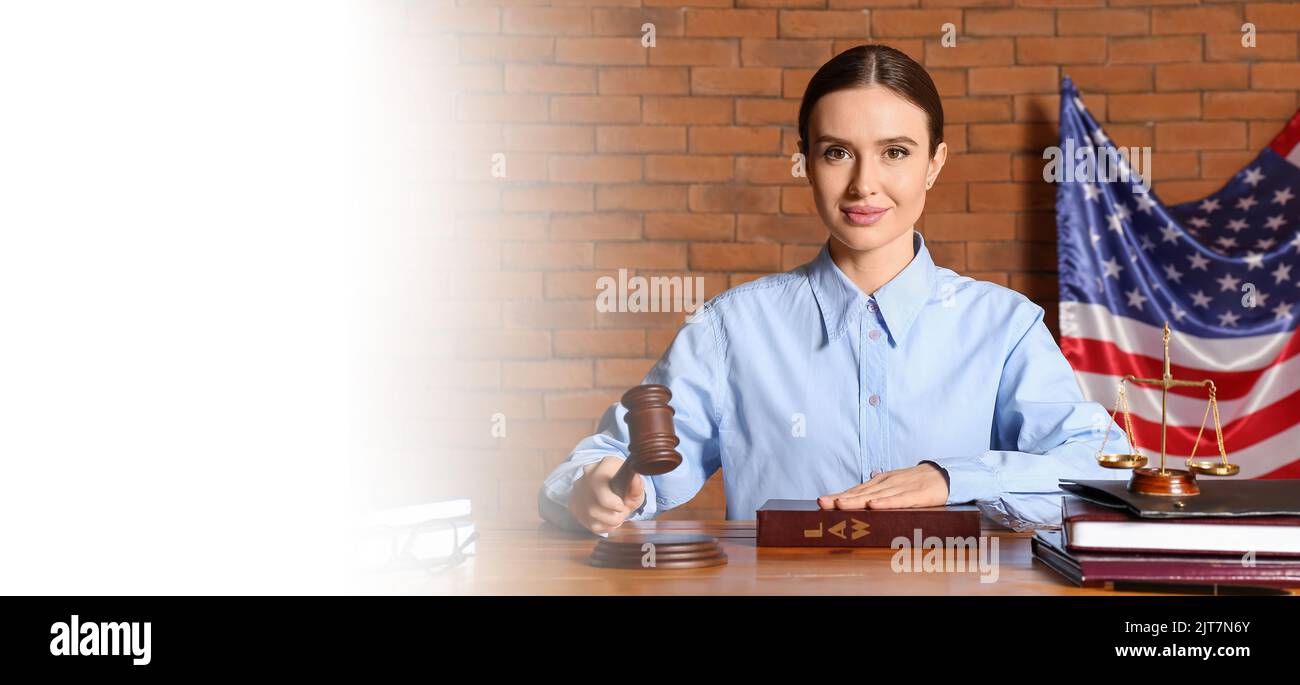 Female judge with gavel sitting at table in courtroom. Banner for ...