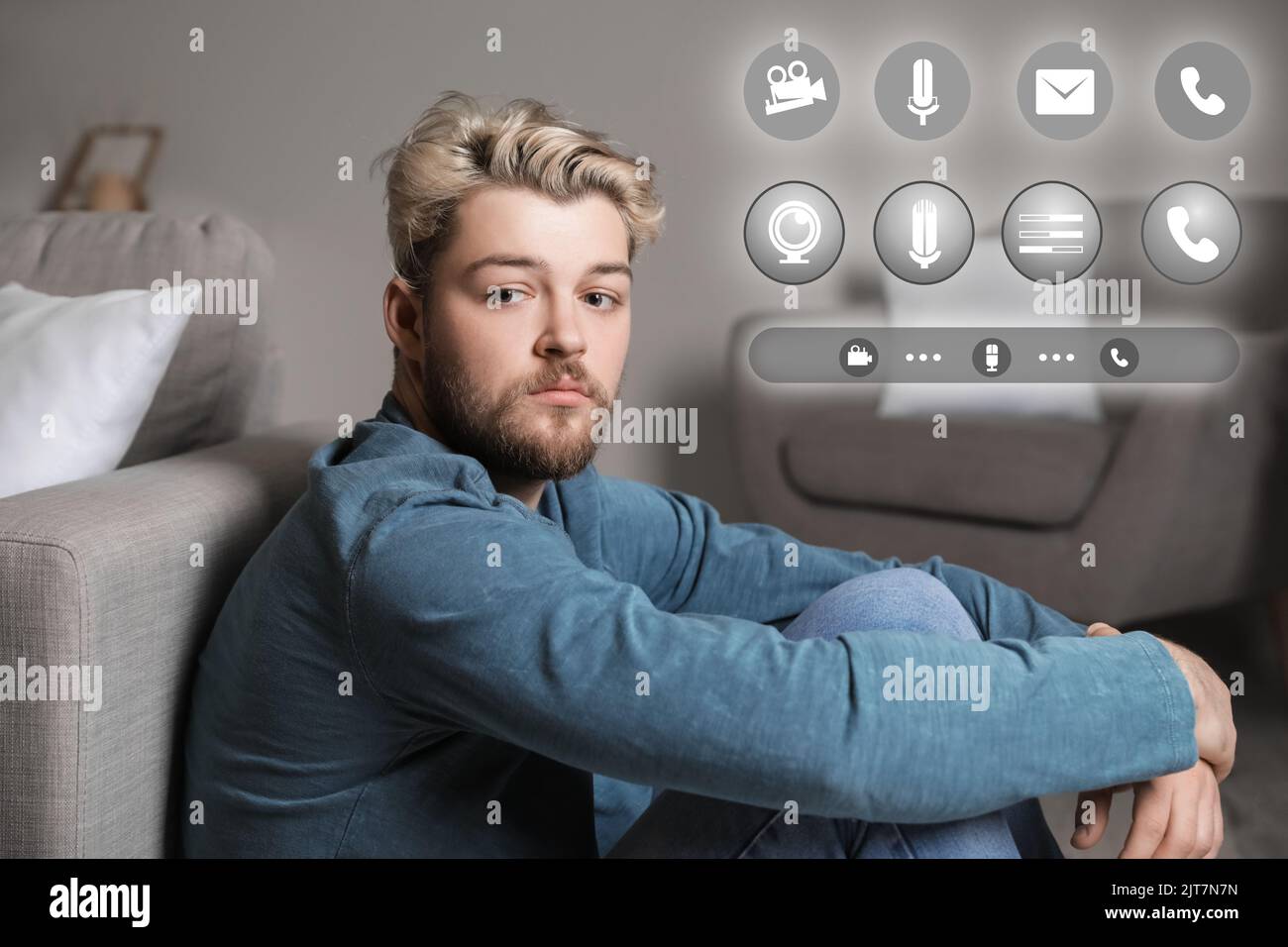 Sad young man video chatting with psychologist Stock Photo - Alamy