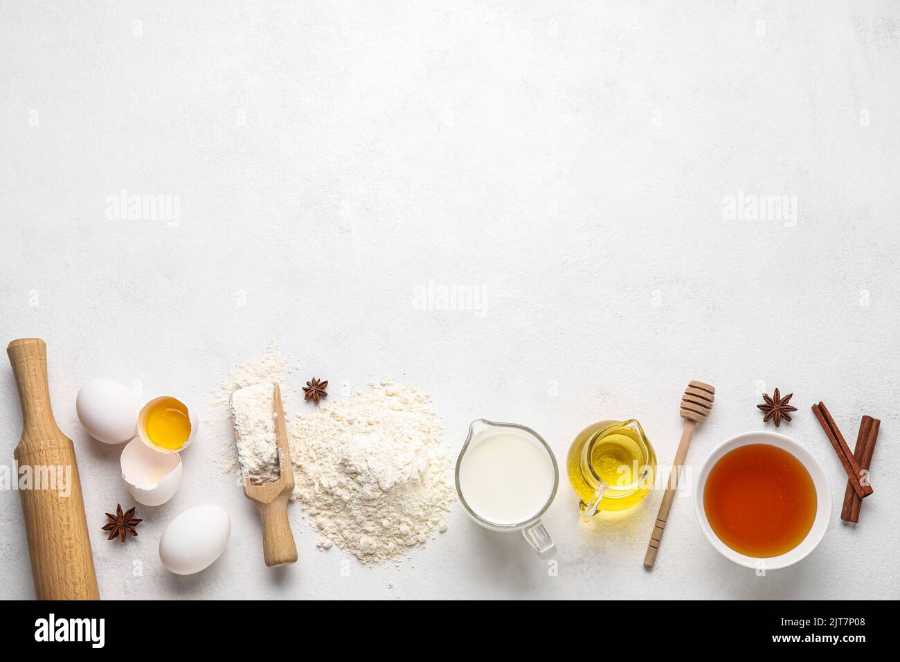 Set of different ingredients for baking on light background Stock Photo ...