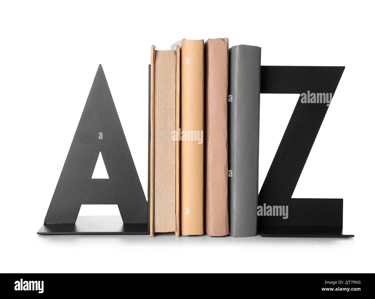 Stylish stand with books on white background Stock Photo - Alamy