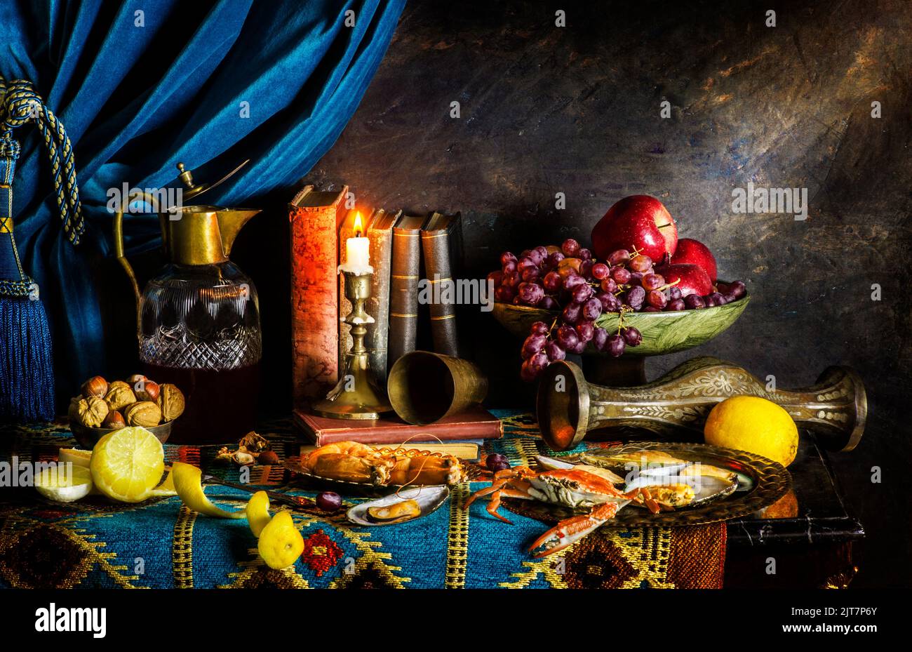 Classic still life with vintage books placed with drink, seafood on ...