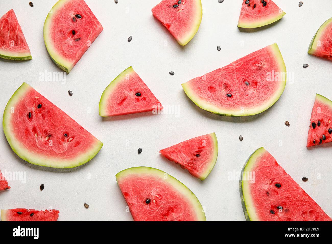 Slices of watermelon and seeds on white background Stock Photo - Alamy