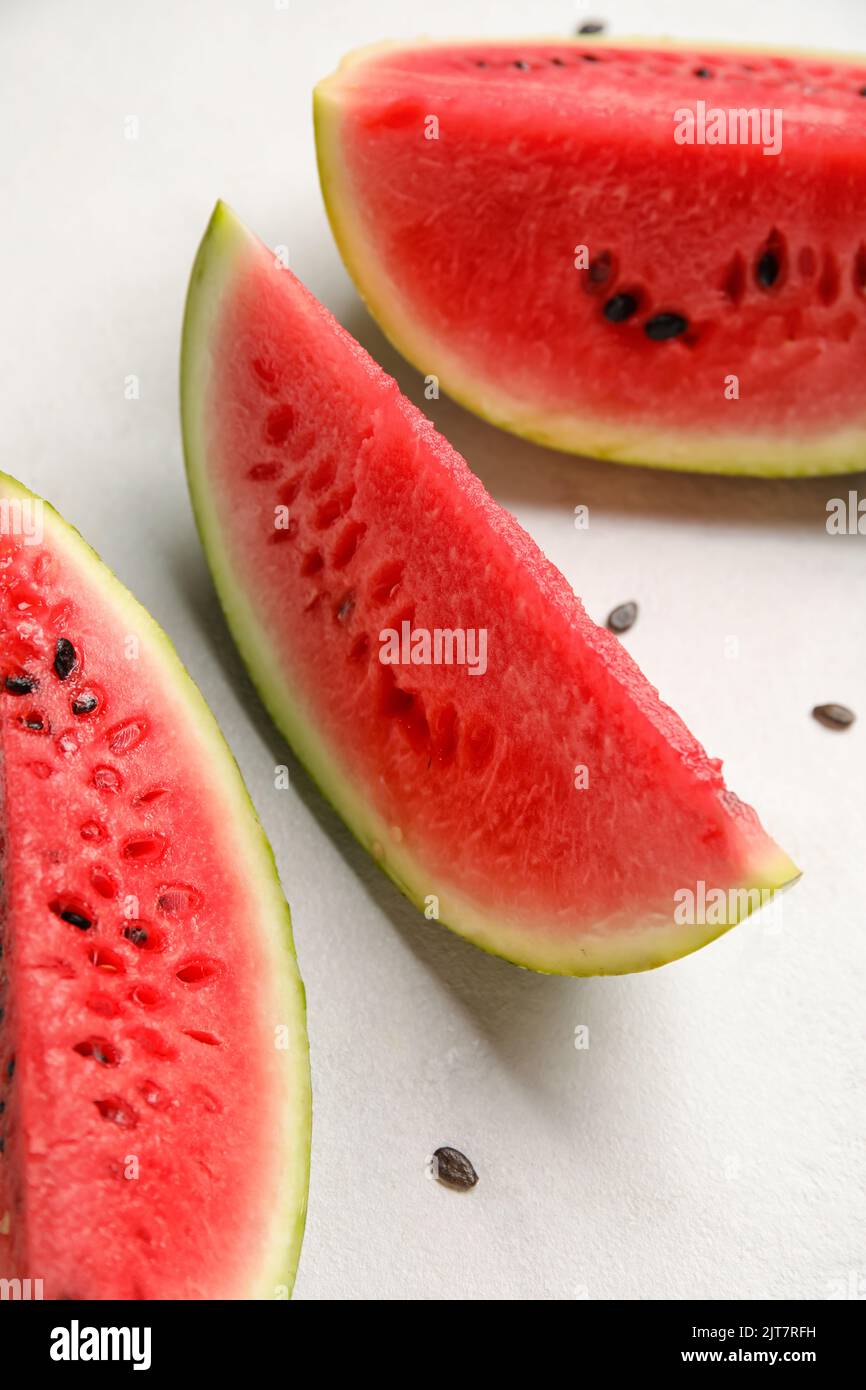 Slices of watermelon with seeds on white background Stock Photo - Alamy