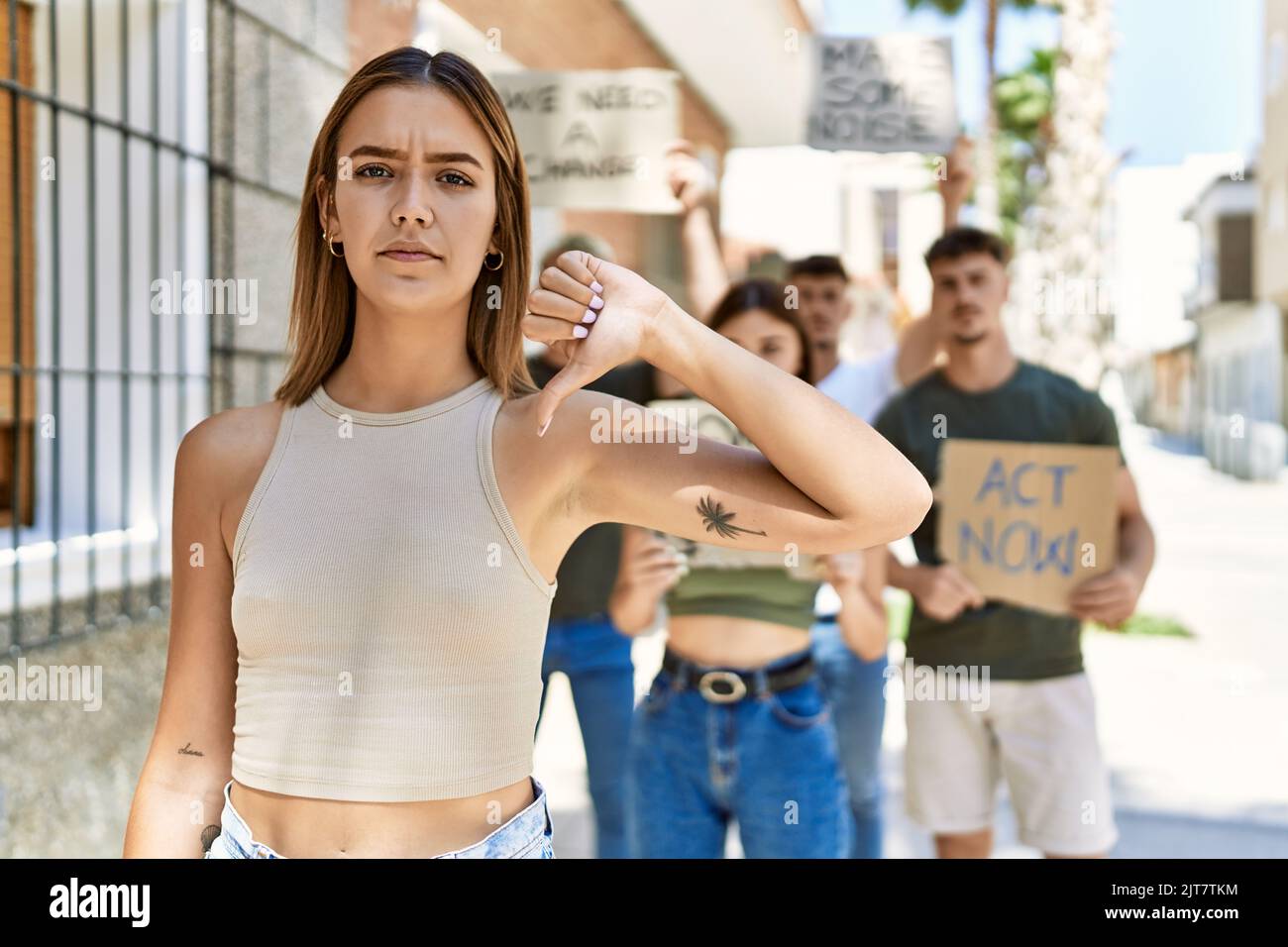 Group of people protesting and giving slogans at the street with angry ...