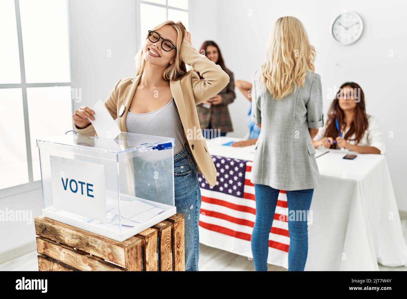 Group of young girls voting at democracy referendum smiling confident ...