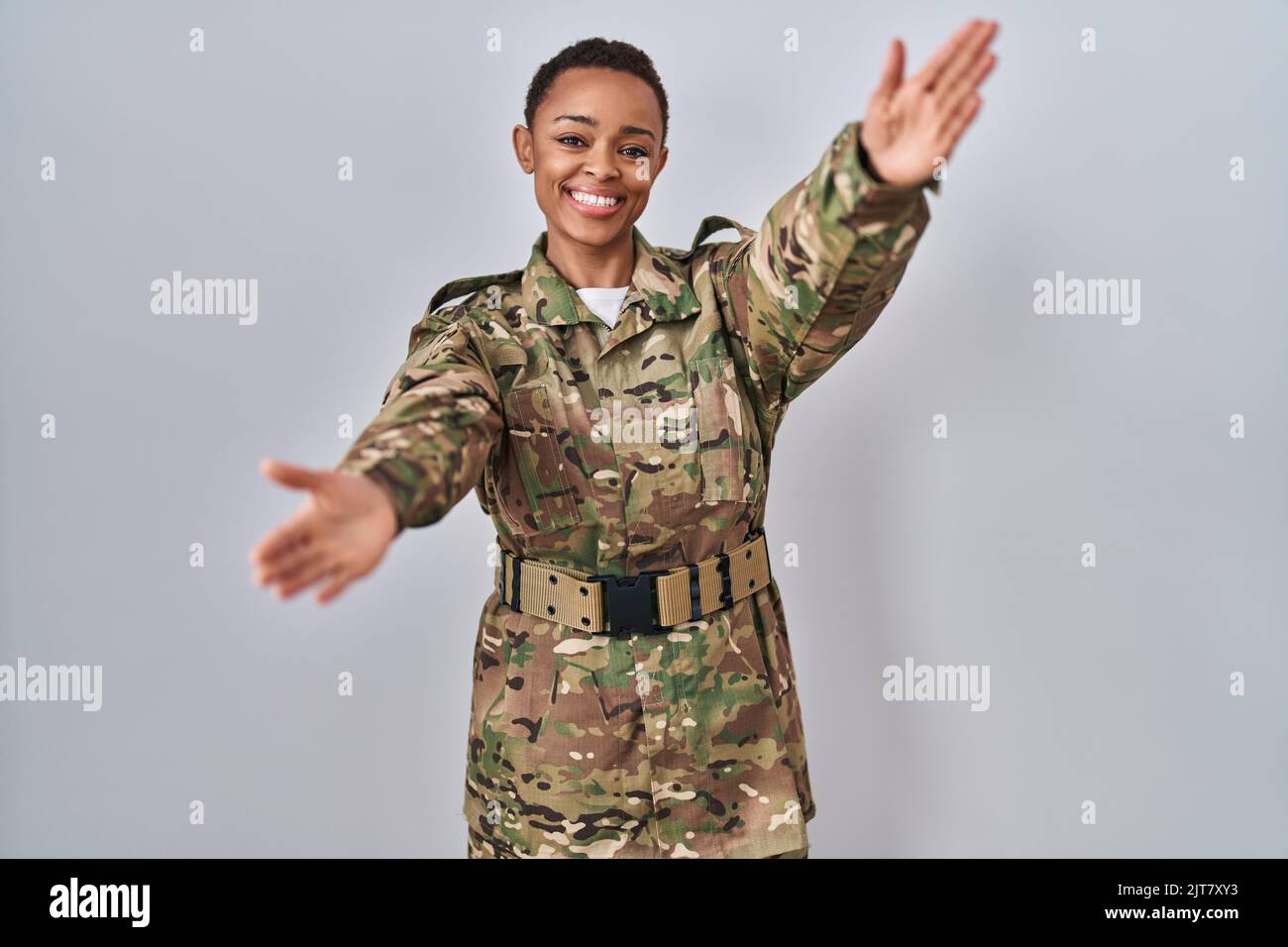 Military uniform arms raised smiling hi-res stock photography and ...