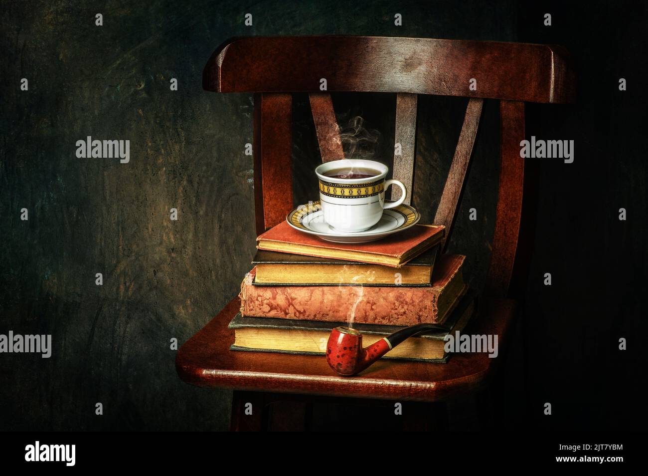 Classic still life with cup of tea placed on vintage books and old pipe ...
