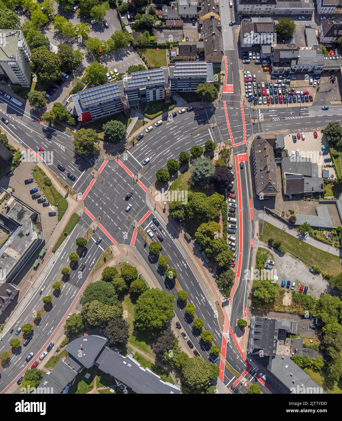 Intersection rheinlandstrasse and berliner strasse with red bike lanes hi-res stock photography ...