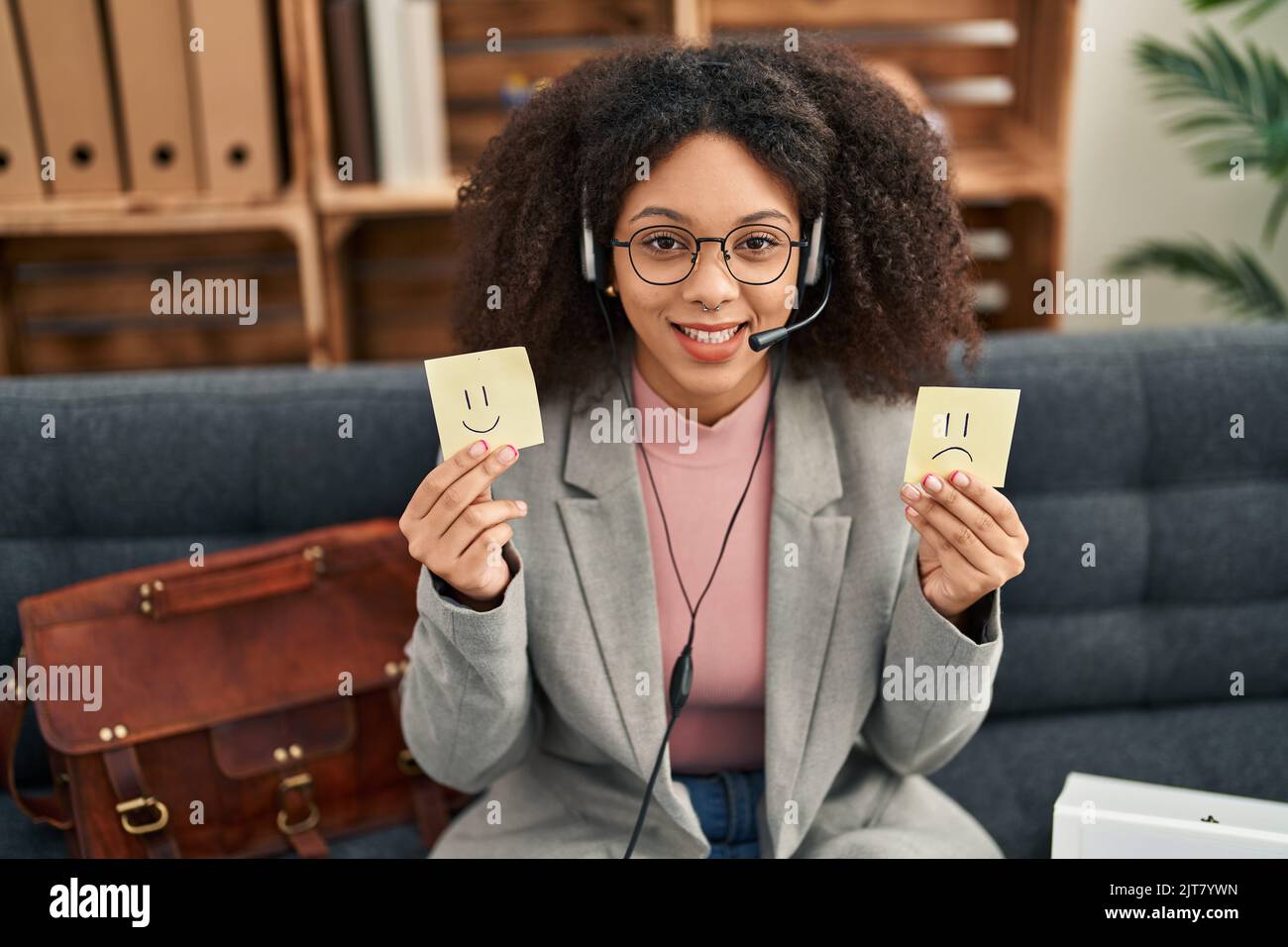 Young african american woman working therapy for depression smiling ...