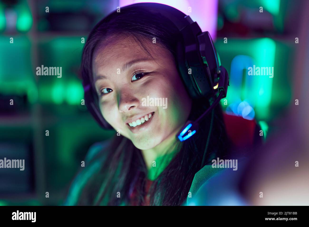 Young chinese woman streamer smiling confident make selfie by camera at ...