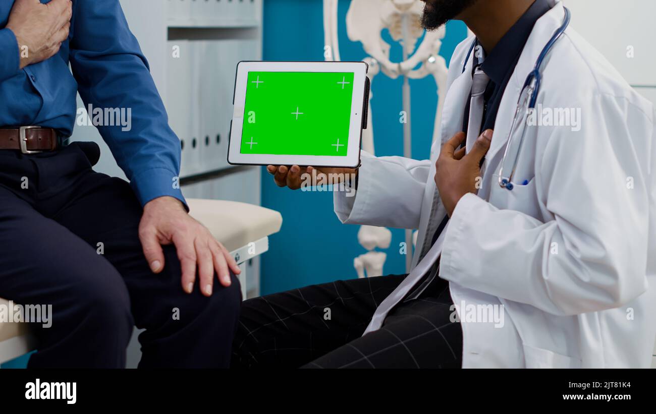 Medical specialist showing horizontal greenscreen hi-res stock ...