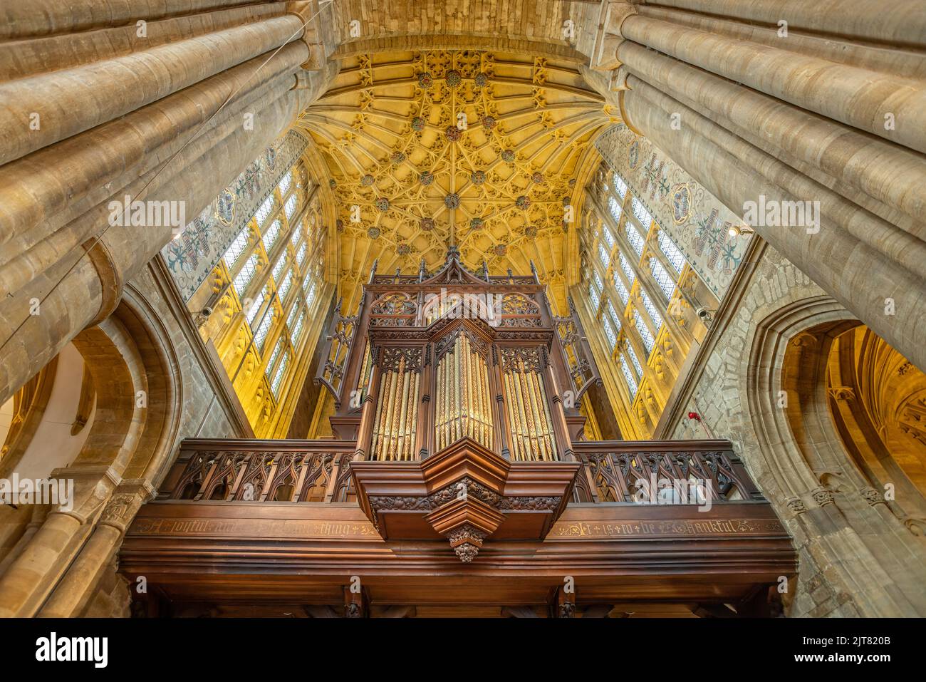 Organ and vaulted ceiling in the North Transept inside Sherborne Abbey, Dorset, UK on 28 August ...