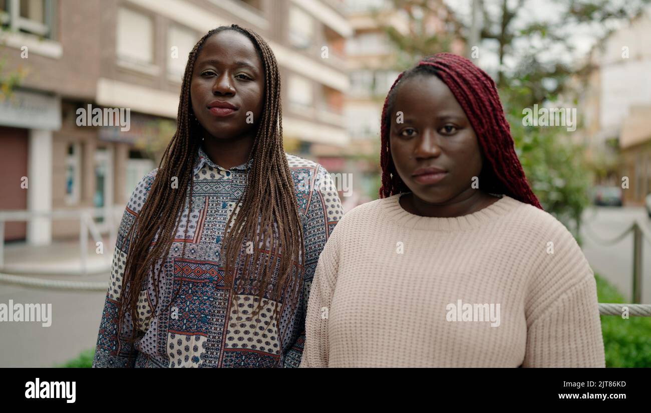 Two adult sisters serious hi-res stock photography and images - Alamy