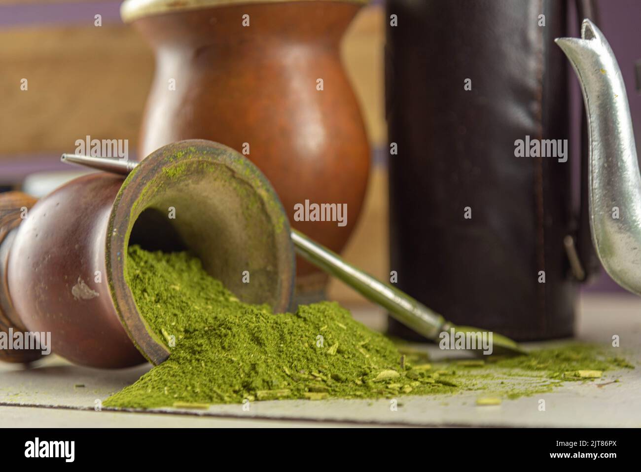 Mate herb (Ilex paraguariensis) and utensils for preparing mate tea ...