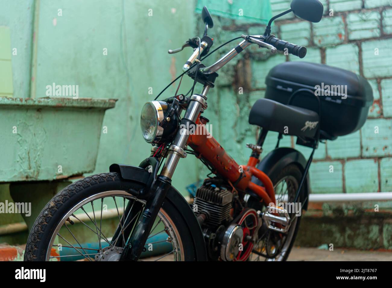 Motor bike or scooter parked in residential yard. Transport vehicle ...