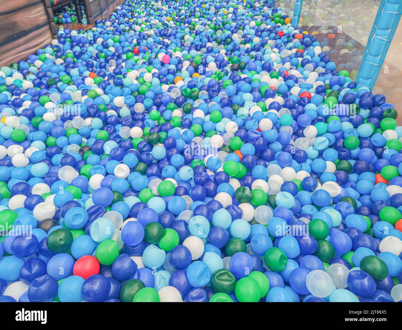 Plastic balls in a children's pool. ball pool. recreation and leisure ...