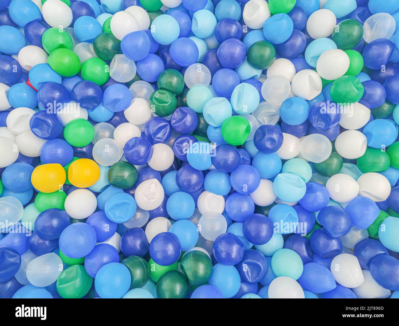Plastic balls in a children's pool. ball pool. recreation and leisure ...