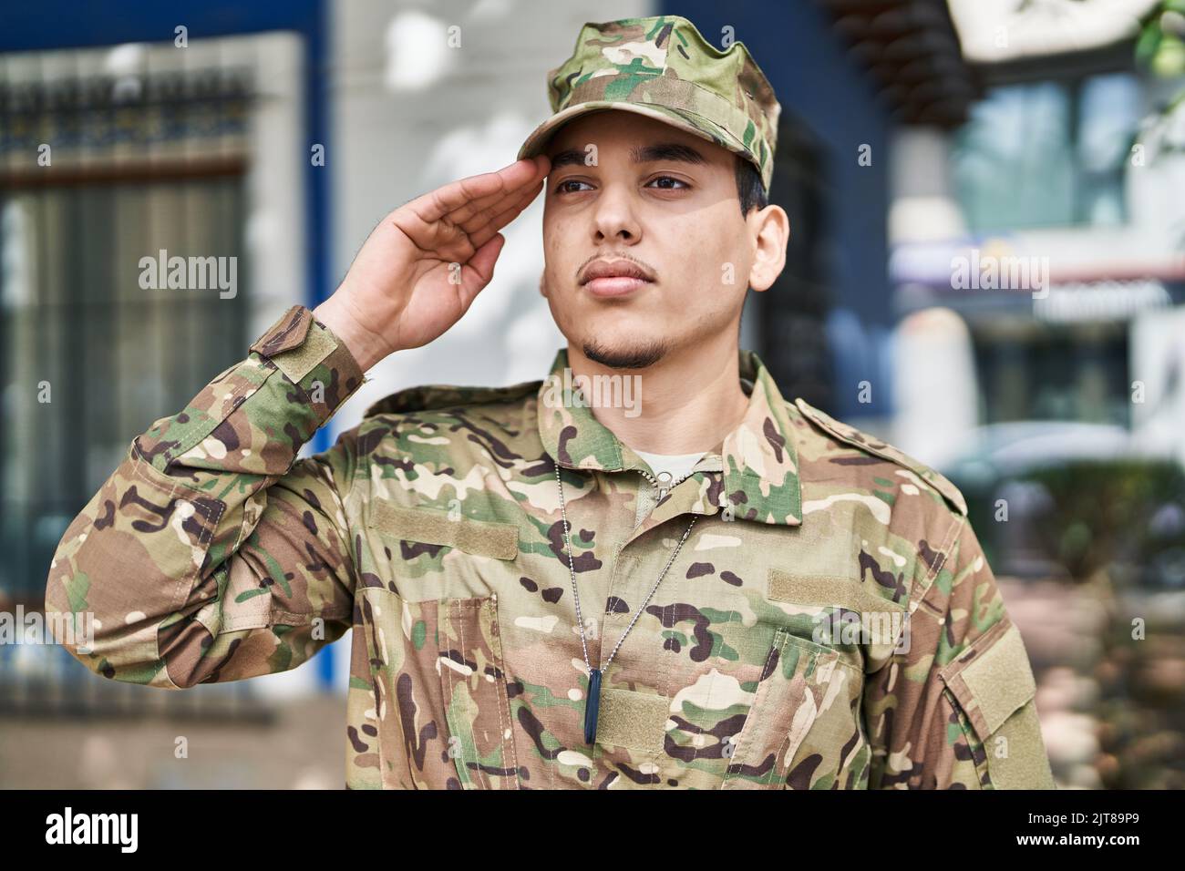 Saluting standing smiling uniform hi-res stock photography and images - Alamy