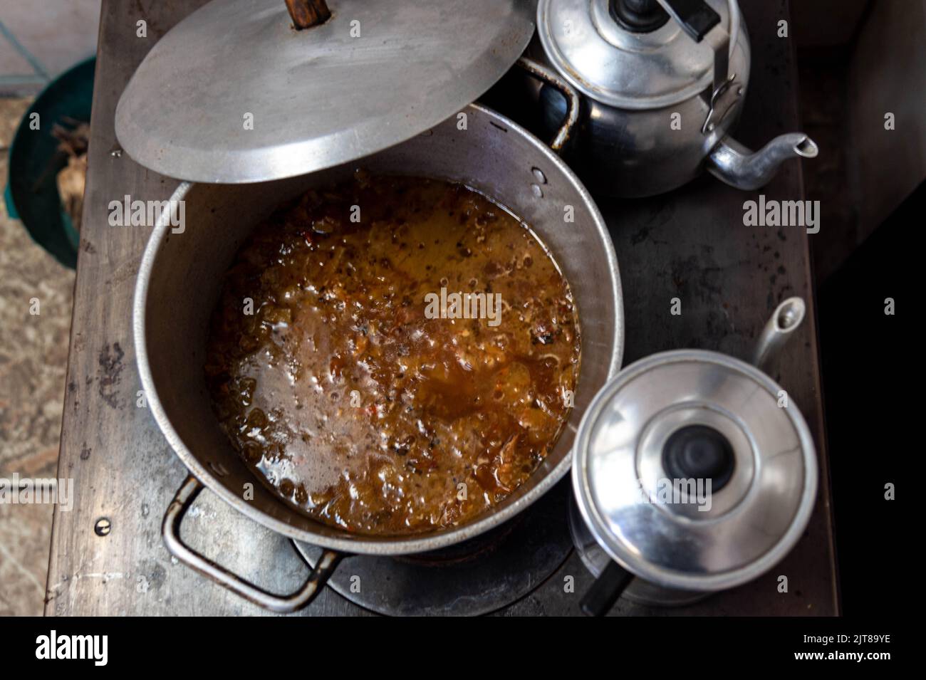 Pots over a wood stove. Wood burning stove. A wood stove, wood stove or ...