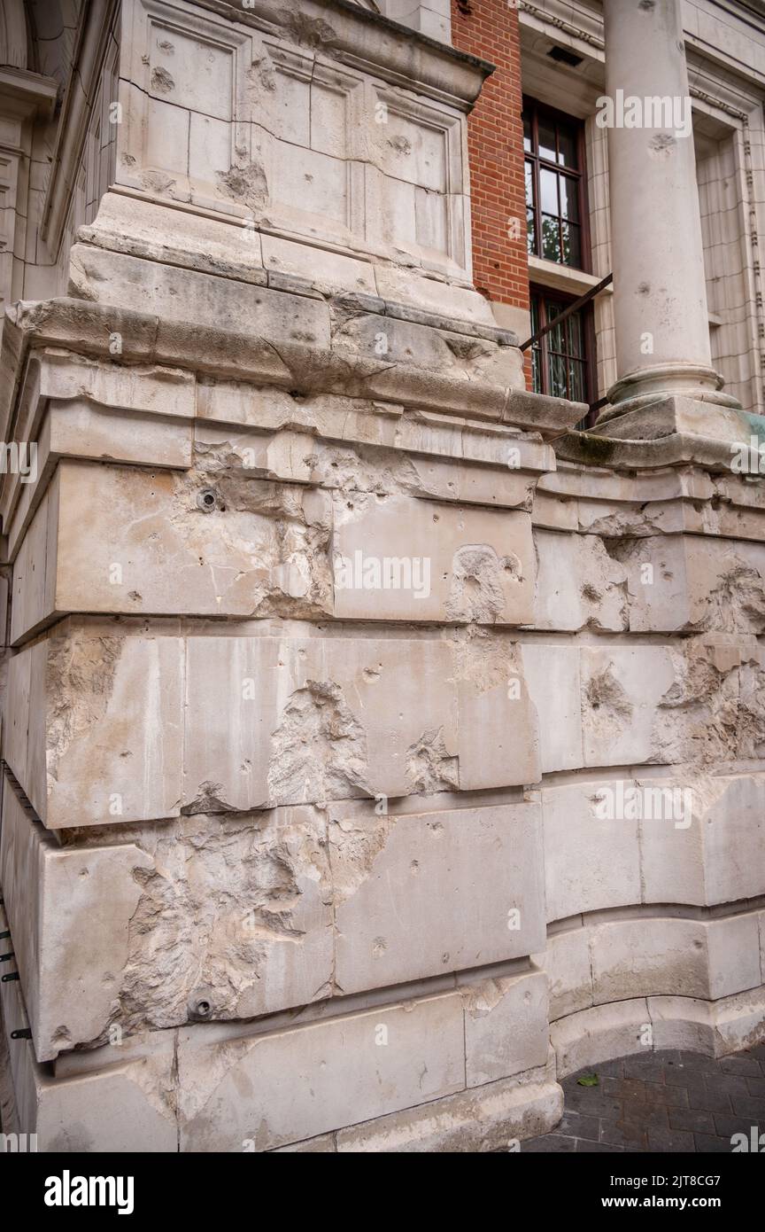 Exterior detail with world war 2 bomb damage at the Victoria and Albert ...