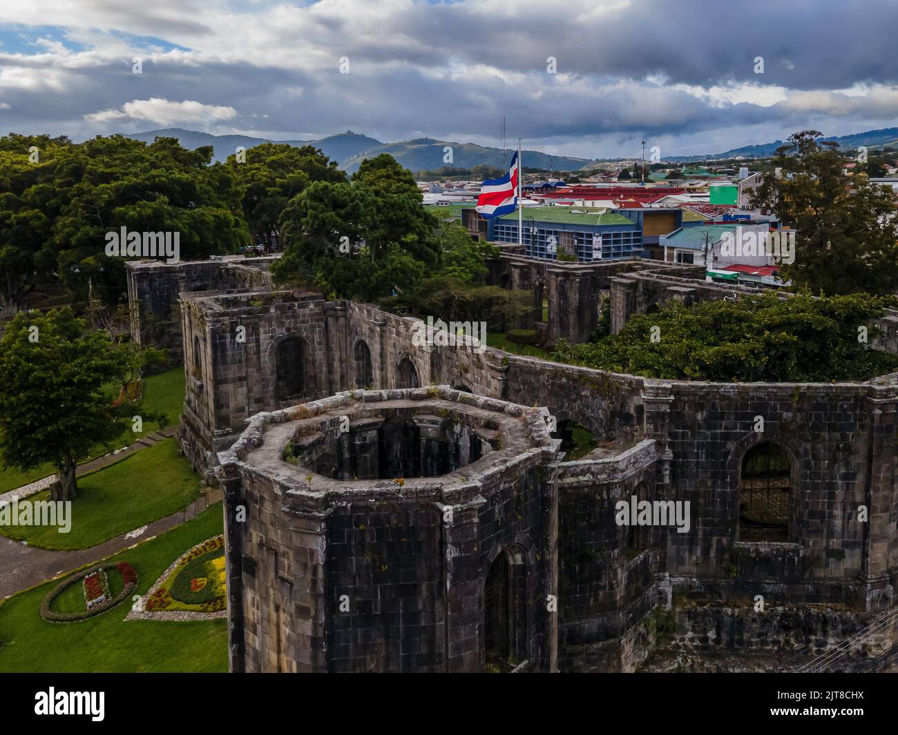 Beautiful aerial cinematic footage of the ruins, the CostaRican Flag ...