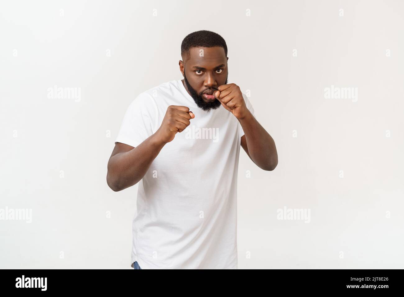 Sporty man during boxing exercises. Photo of boxer on isolated on white ...