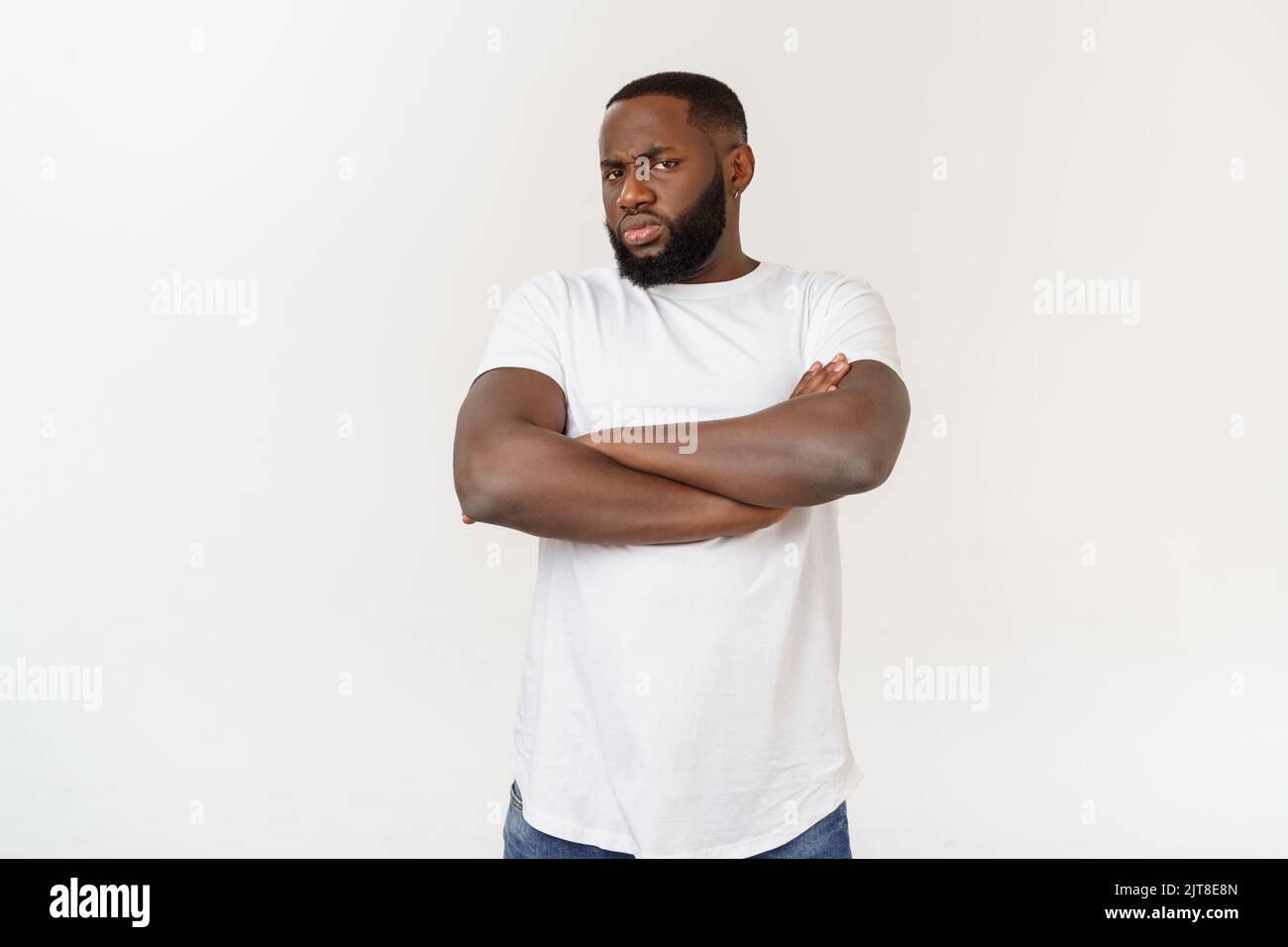 Head shot of an angry African-american man looking sharply towards the ...