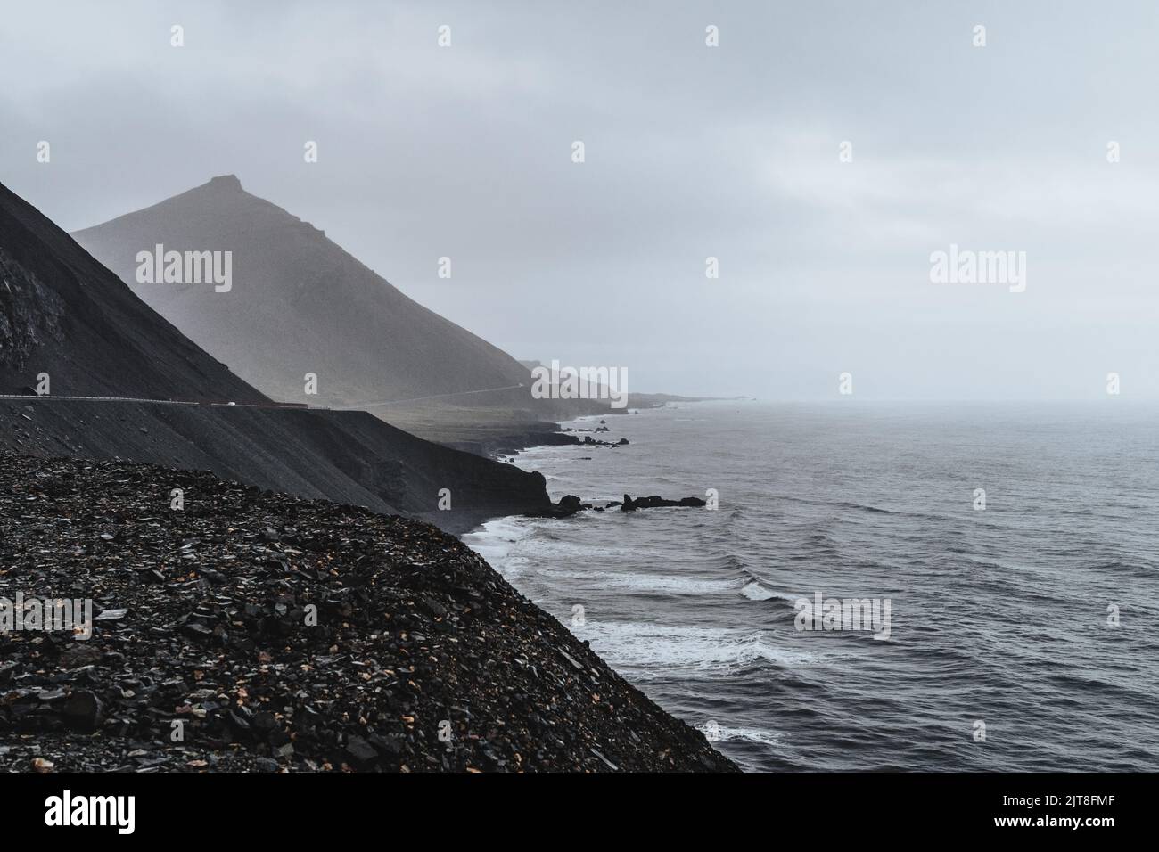 Mountain scene on Icelandic coast Stock Photo - Alamy
