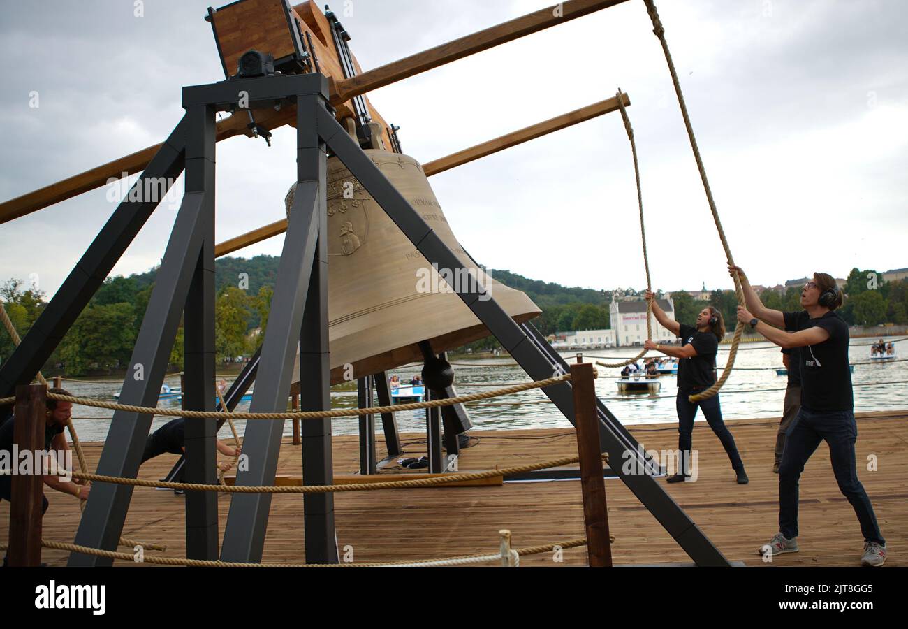 Prague, Czech Republic. 28th Aug, 2022. People ring a memorial bell on ...