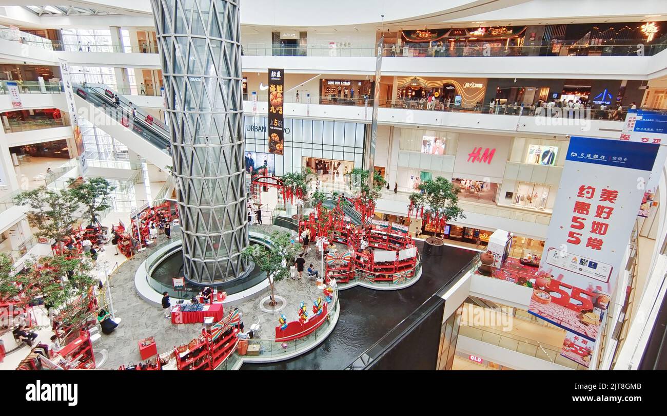 SHANGHAI, CHINA - AUGUST 28, 2022 - Citizens shop at a mall in Shanghai ...
