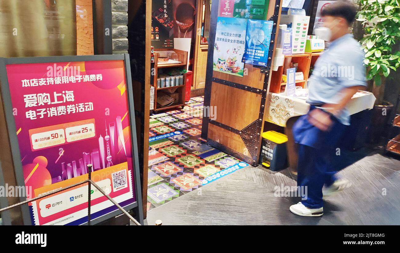 SHANGHAI, CHINA - AUGUST 28, 2022 - Citizens shop at a mall in Shanghai ...