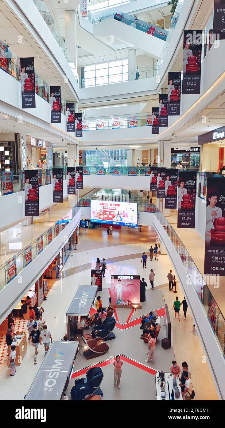 SHANGHAI, CHINA - AUGUST 28, 2022 - Citizens shop at a mall in Shanghai ...