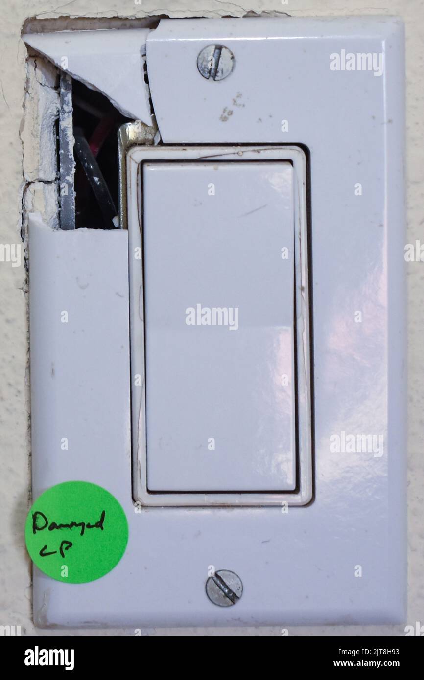 Cracked light switch Stock Photo - Alamy