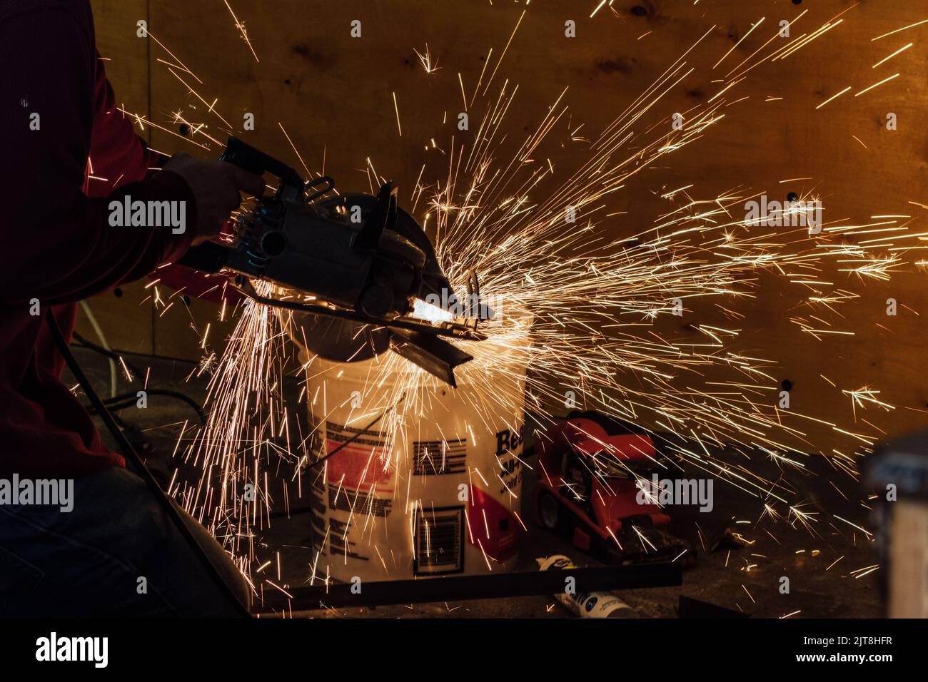man welding with sparks flying Stock Photo - Alamy