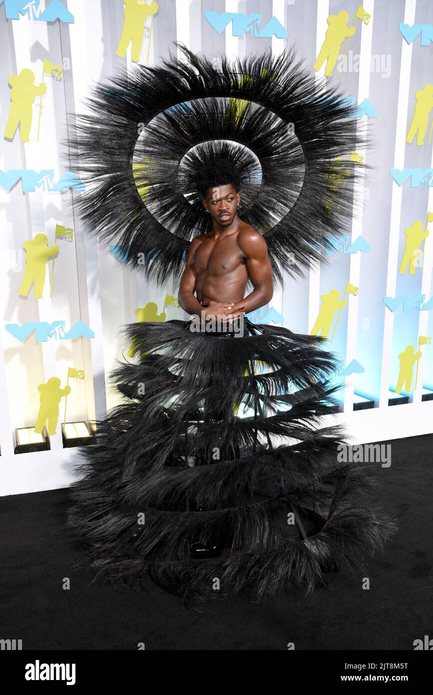 Lil Nas X walking on the red carpet at the 2022 MTV Video Music Awards ...