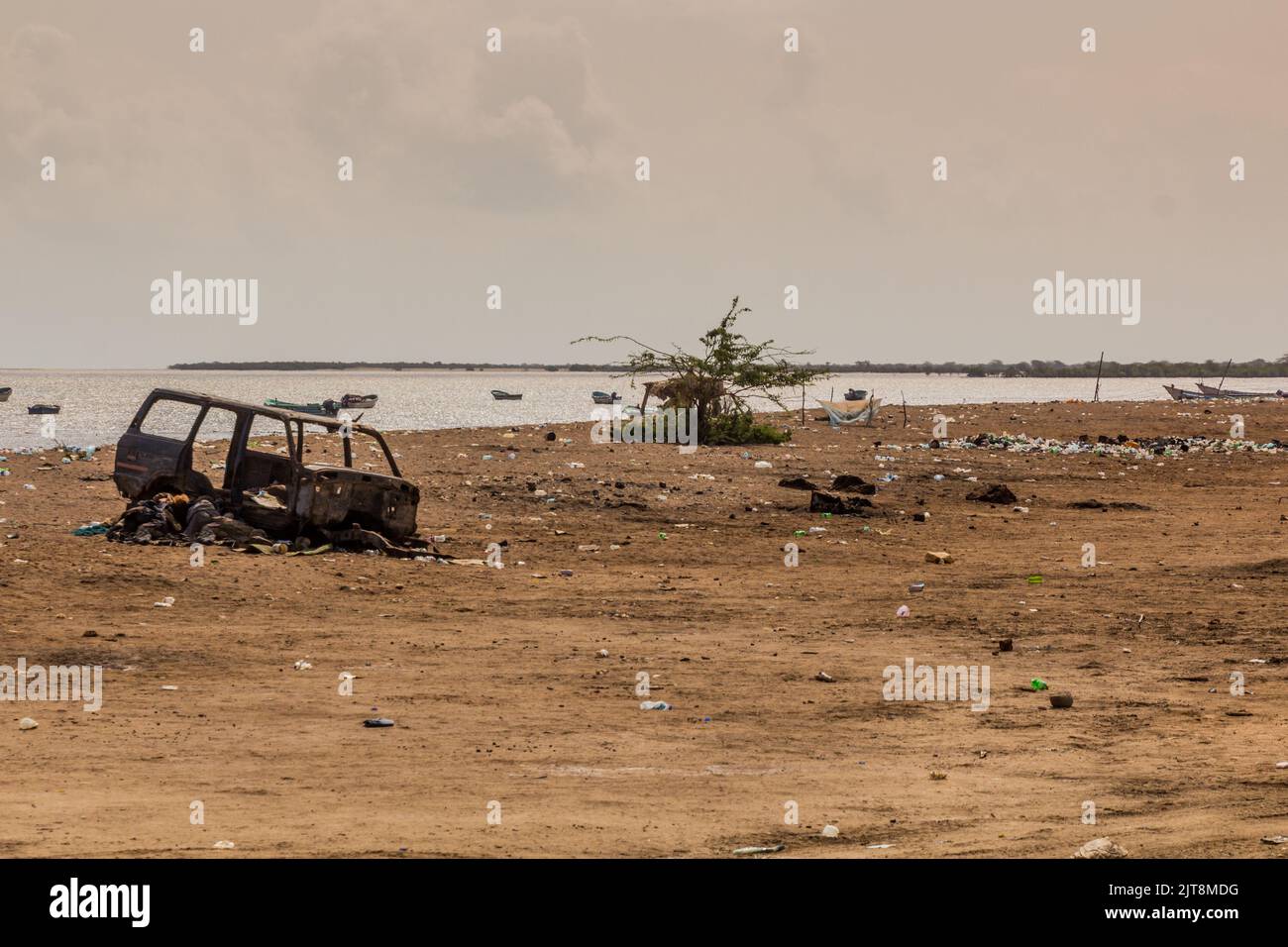 Car wreck on the beach in the border town Lawyacado in western ...