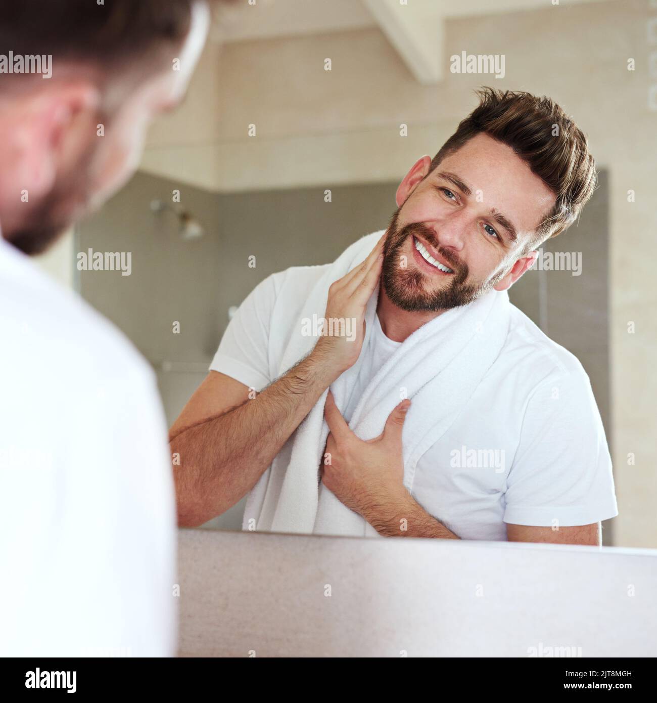 Feeling fresh and fantastic. a handsome young man going through his ...
