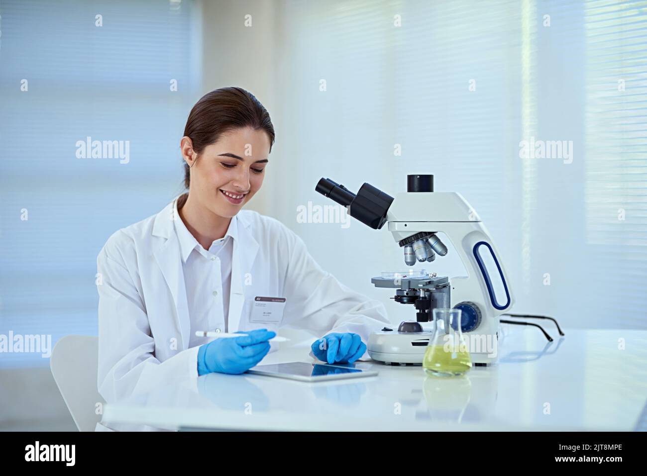 Making sense of the world through science. a female scientist working ...