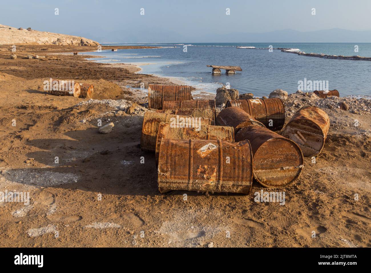 Old rusty barrels around saline lake Assal in Djibouti Stock Photo - Alamy