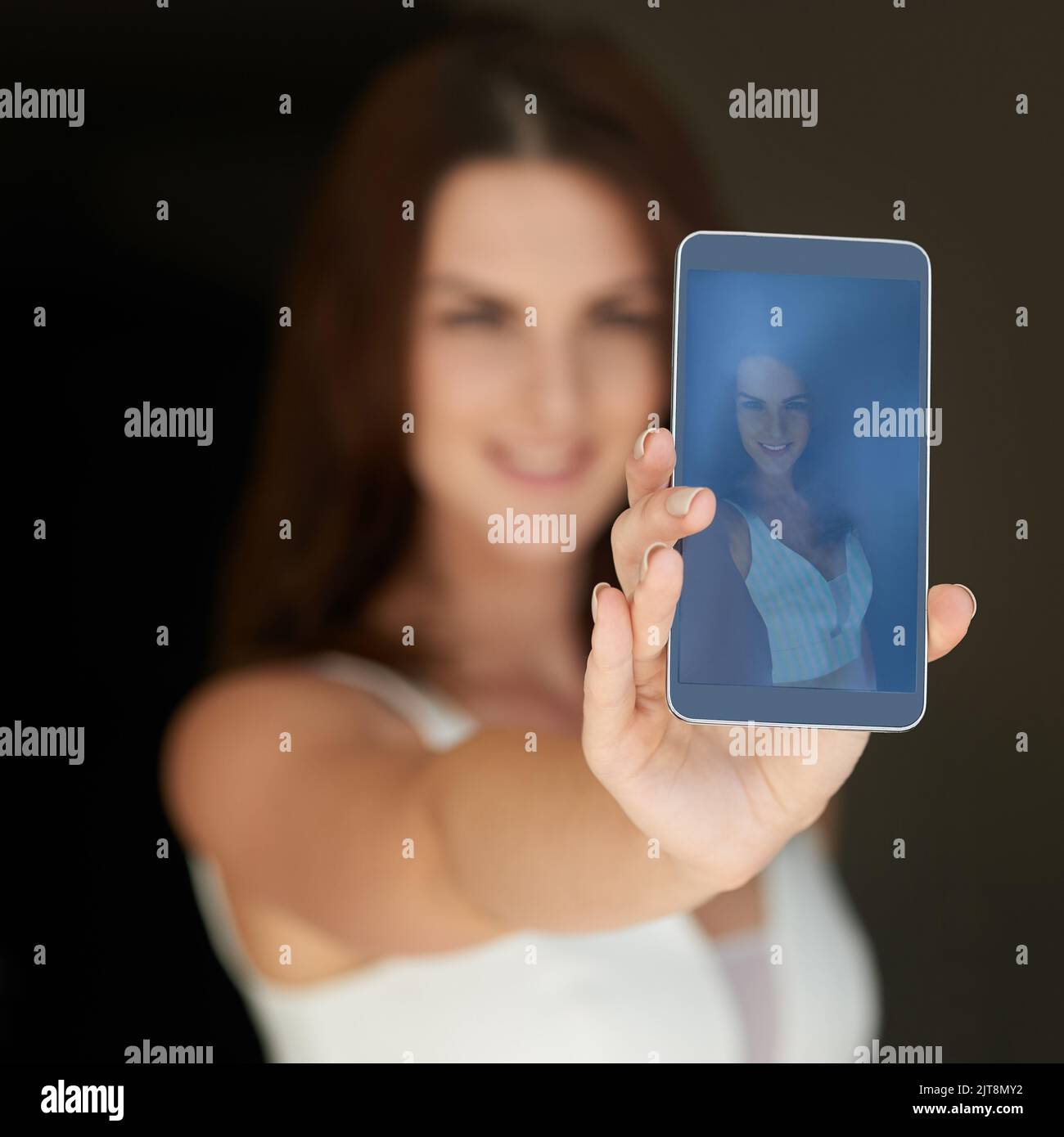 Snapping one for a new profile picture. Studio shot of an attractive ...