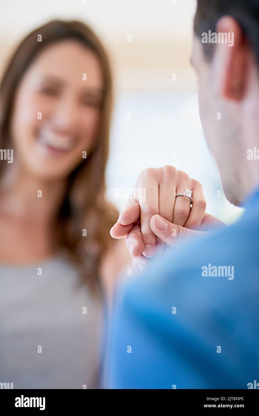 Love is worth celebrating. a young couple getting engaged Stock Photo ...