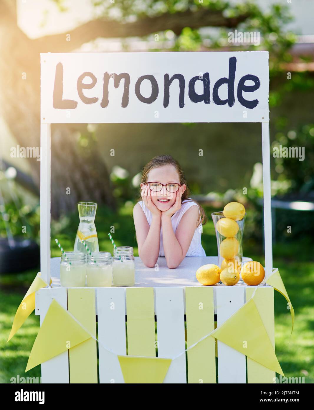 Youll be coming back to buy seconds. Portrait of a little girl selling ...