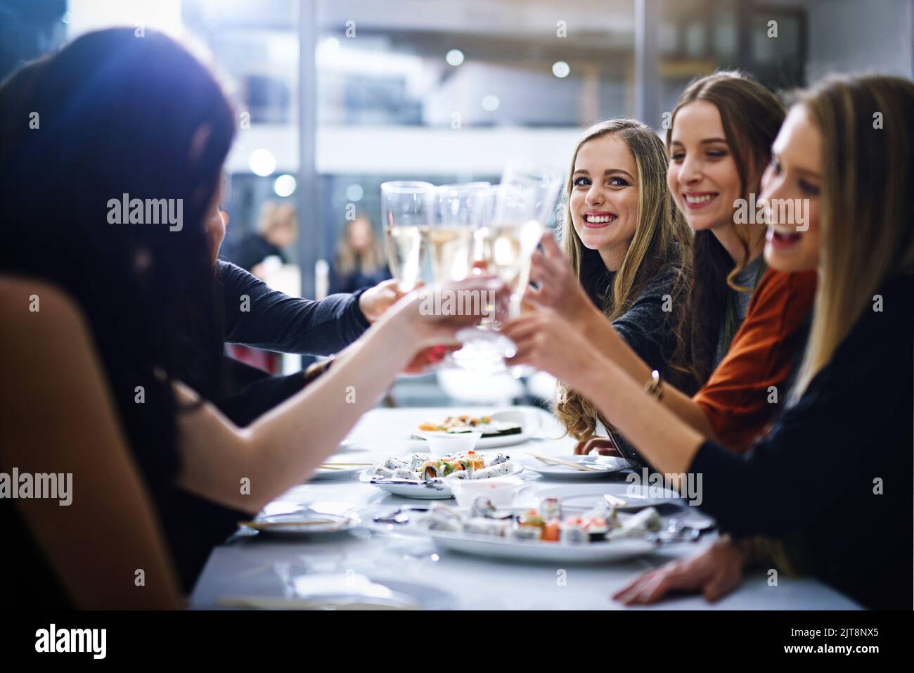 Heres to a good night with great friends. friends having a dinner party ...