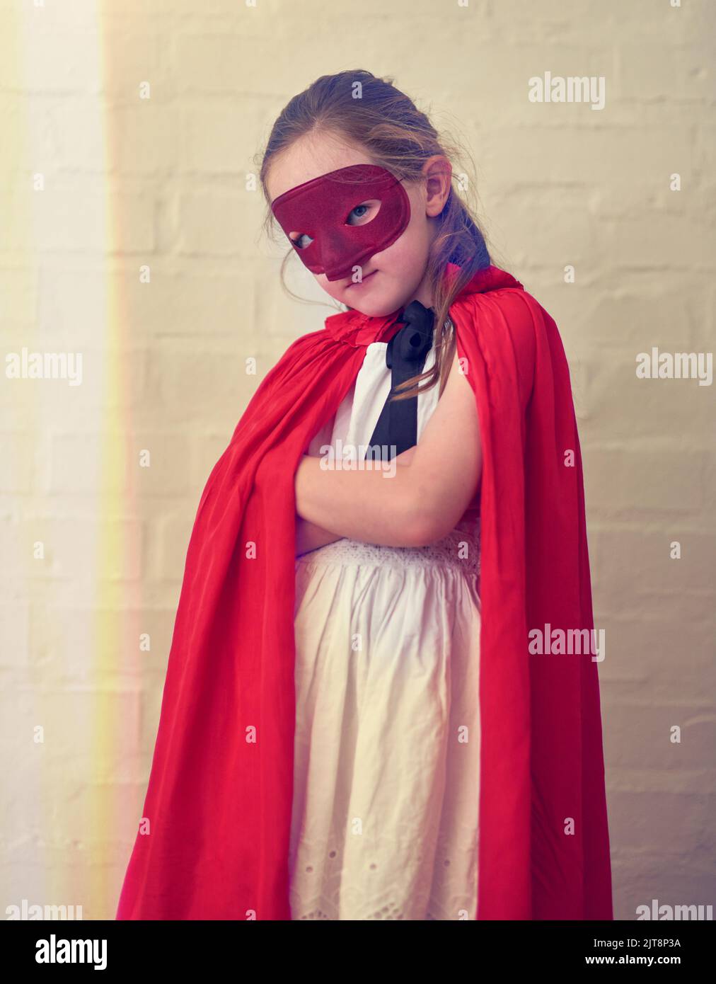 Of course Ive got magical powers. Portrait of a little girl pretending ...