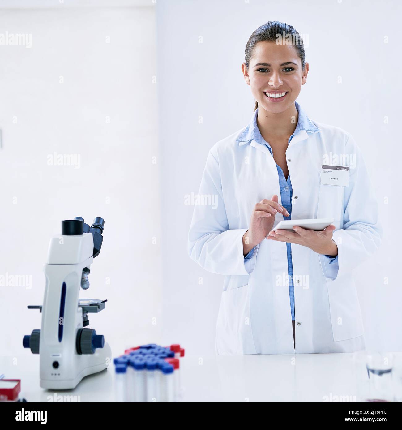 Technology is a vital tool for every researcher. Portrait of a young ...