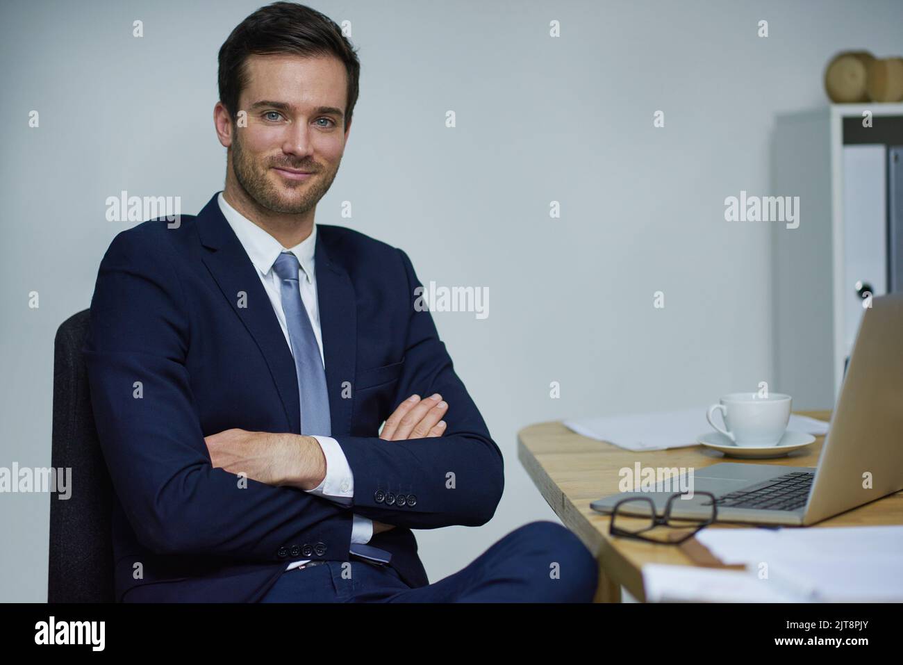 Hes the man to get the job done. Portrait of a confident young ...